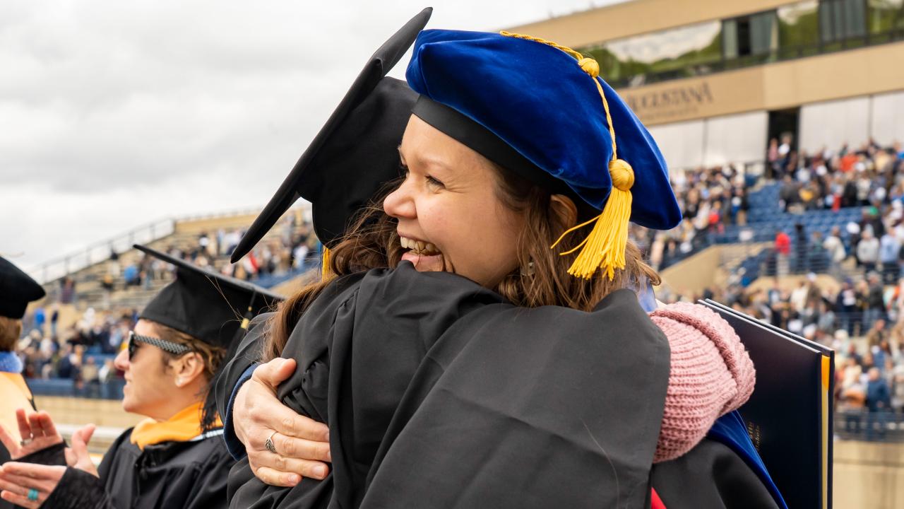 Dr. Jennifer Gubbels Hugging Student, Commencement 2022 | Augustana ...